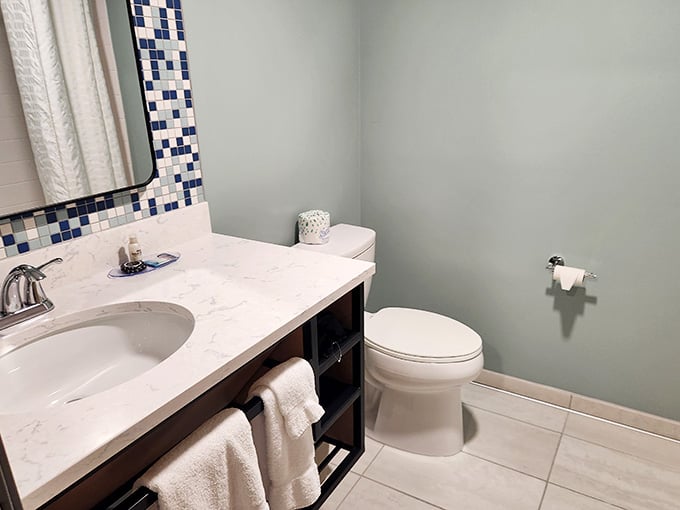 Clean, calm, and thoughtfully designed, this bathroom proves that the details matter even when you're between waterslide runs.