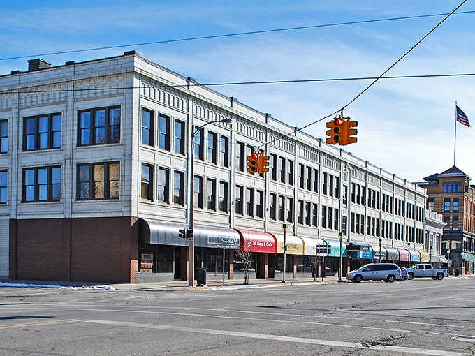 Bay City's grand corner building commands attention with its ornate facade and colorful awnings, a reminder that this city has always meant serious business.