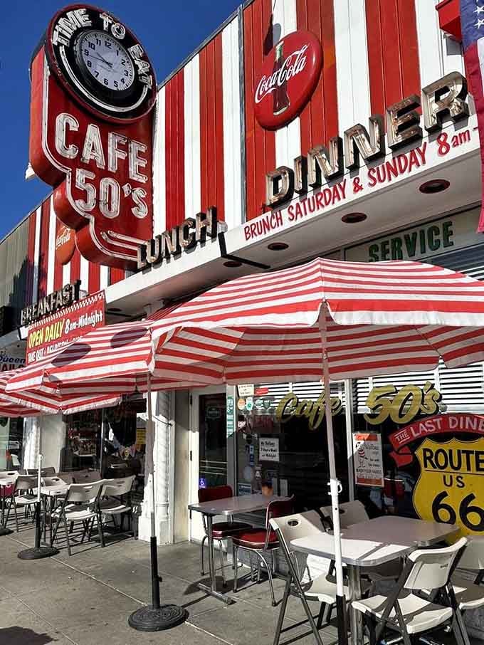 Red-and-white stripes, a giant clock, and a Route 66 sign outside Cafe 50's make Santa Monica Boulevard feel like the center of the universe.