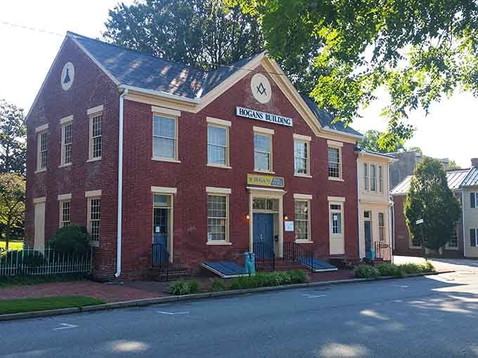 The Hogans Building's handsome red brick facade and Masonic compass symbol give Chestertown the kind of architectural gravitas that makes history feel genuinely exciting.