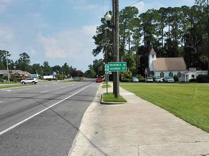 The road sign pointing to Brunswick and Savannah reminds us that great adventures often start at small-town crossroads.