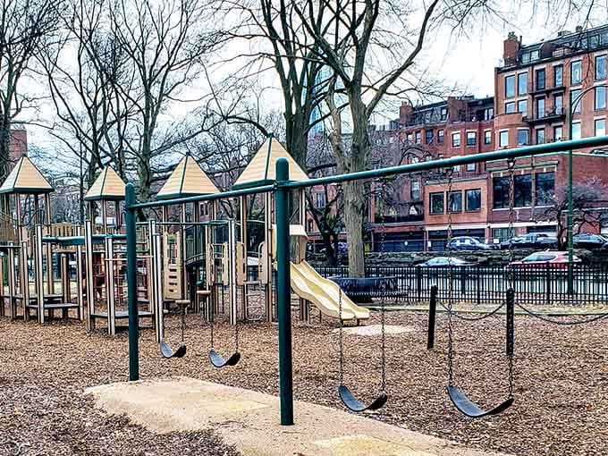 Classic swings never go out of style, especially when framed by charming architecture and winter trees.