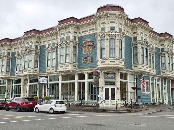 The Victorian Inn's ornate teal facade in Ferndale looks like a wedding cake designed by a very ambitious architect.