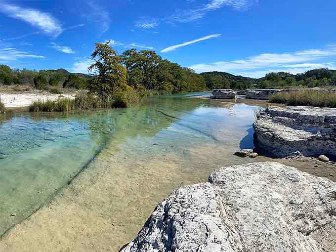Crystal-clear water flows over smooth limestone, creating pools so inviting they practically beg you to kick off your shoes.