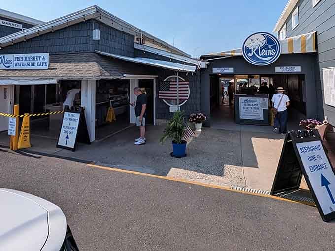 Two entrances, a round American flag roundel, and signs pointing every which way &mdash; Klein's Fish Market is organized chaos at its most delicious.