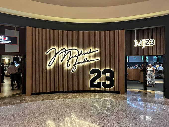 That glowing MJ23 signature wall is so iconic it practically deserves its own standing ovation before dinner even starts.