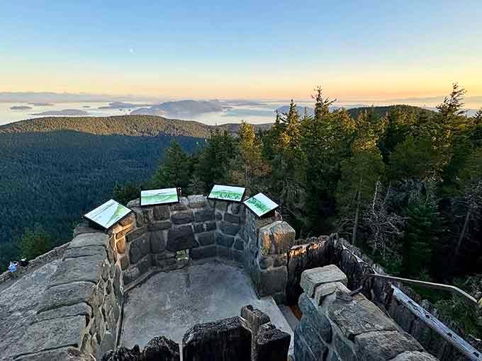 Stone observation tower windows frame mountain views that make every step up those stairs absolutely worth the climb.