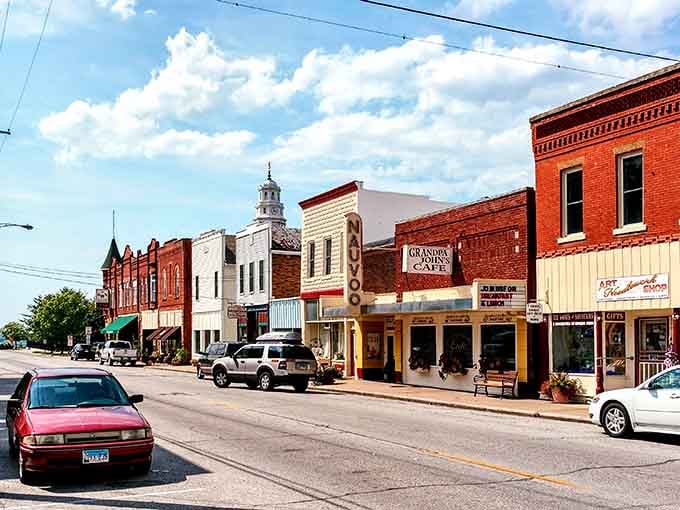 Nauvoo's main street, with Grandpa John's Cafe and the old theater marquee, looks like a place where time slowed down on purpose.