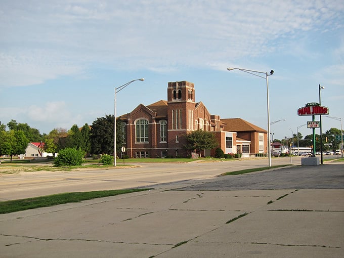 A handsome brick church anchors a quiet Rantoul intersection, standing solid and steady against a wide-open Midwestern sky.
