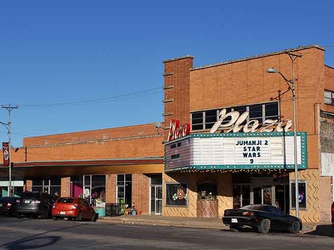 Pampa's Plaza Theatre marquee still lights up the street, currently showing Jumanji 2 and Star Wars 9 like it's movie night forever.
