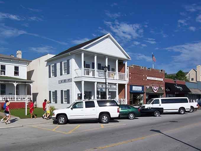 That classic white building with the porch screams Southern hospitality louder than any welcome sign ever could.
