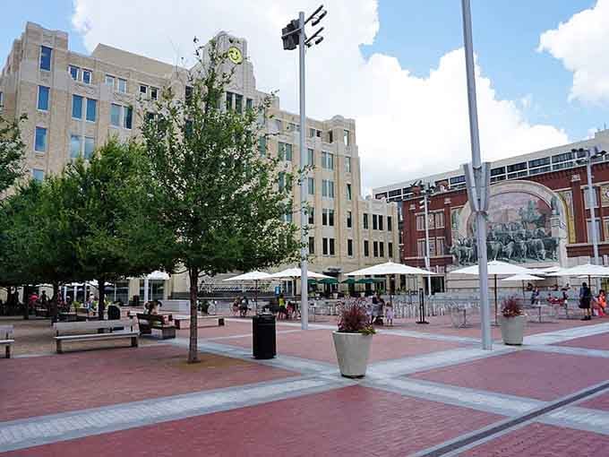 Red brick pavers, white umbrellas, and happy crowds gather at Sundance Square, the beating heart of Fort Worth.