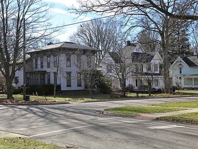 These stately 19th-century homes stand shoulder to shoulder, wearing their history like a perfectly tailored coat.