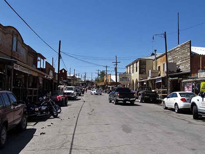 The Oatman Hotel sign stands watch over a dusty main street that looks lifted straight from a John Ford Western.