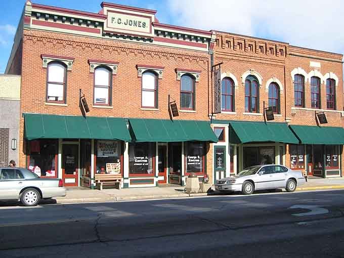 The F.C. Jones building anchors Oregon's downtown block with its handsome brick facade and matching green awnings, neat as a pin.