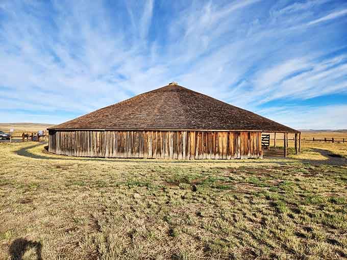 Seen from the other side, the Round Barn's conical roof and weathered cedar walls look like something straight out of a frontier legend.