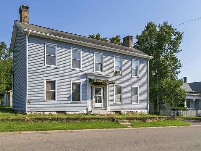 A pale blue Federal-style house in Piketon sits so serenely on its corner lot that you half expect a rocking chair to appear.