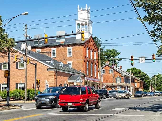 The white church steeple rises above brick buildings like a beacon guiding travelers to something special.