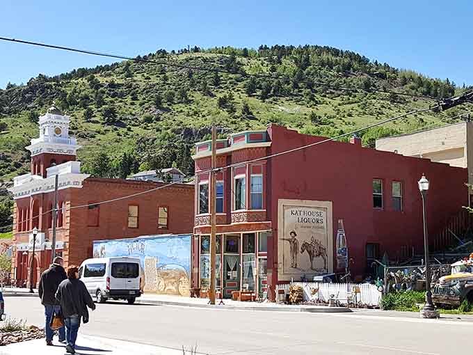 Red brick buildings nestle against green hillsides, showing how this working-class mining town has weathered over a century.