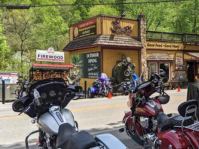 Motorcycles line up outside the rustic wooden building where bikers gather for good times and grub.