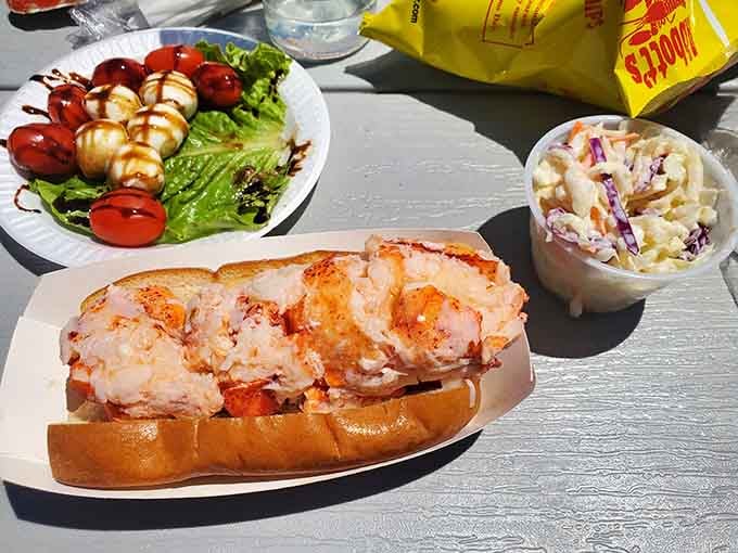 That lobster roll is so generously loaded it's practically spilling over, which is exactly the kind of problem everyone should have.