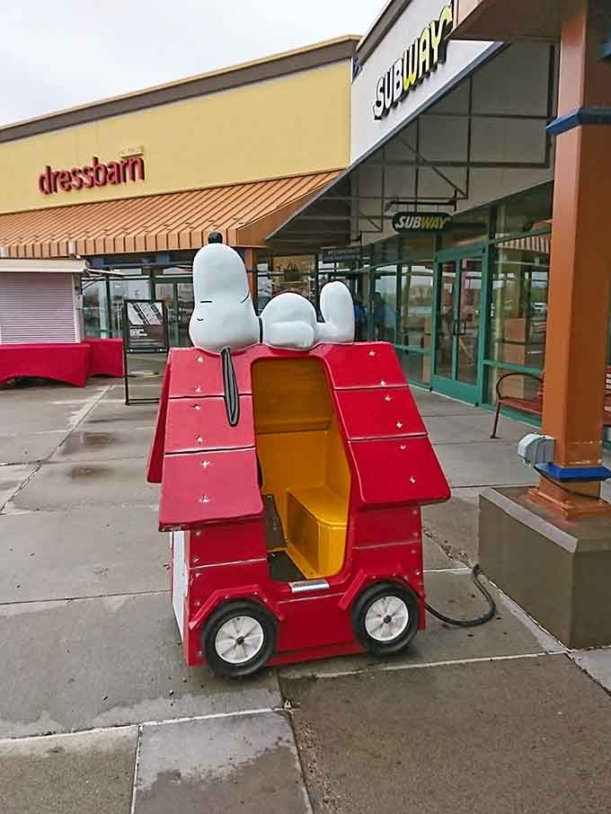 Even Snoopy needs a break from the shopping action, though this ride costs considerably less than everything inside.
