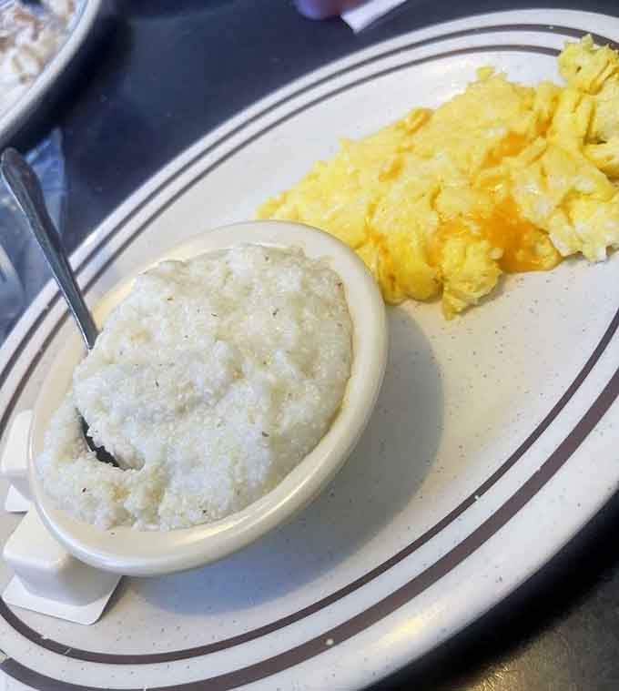Creamy grits and scrambled eggs on one plate. This is the Southern breakfast combination that started civilizations.