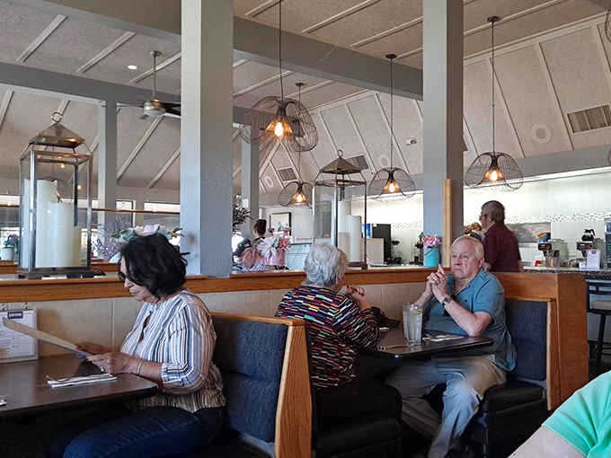 Regulars settling into their favorite booths. This is what a community gathering place actually looks like.