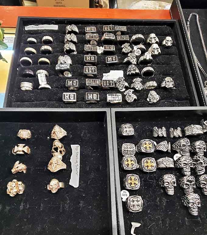 Skull rings, biker rings, veteran rings, basically a whole personality in a velvet-lined display case.