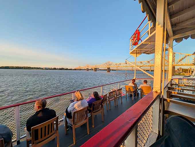 Golden hour on the Ohio River, with a bridge in the distance and not a single care in sight.