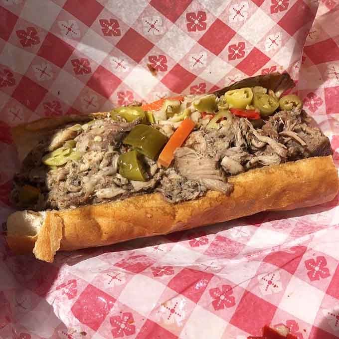 Loaded with tender pulled meat and giardiniera, this Italian-style sandwich is a beautiful, glorious mess.
