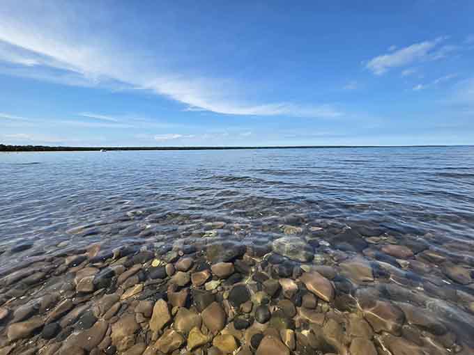 Lake Superior's shoreline rocks sit under water so clear it almost feels like cheating to look at it.