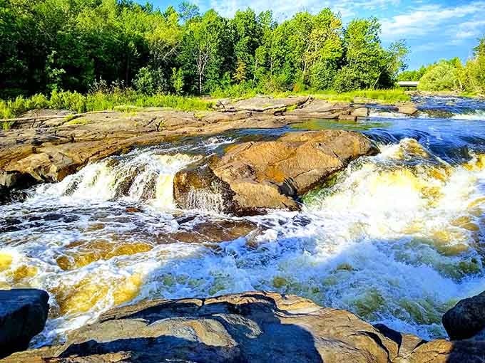The Bigfork River splits around the rocks here like it's been practicing this move for ten thousand years.