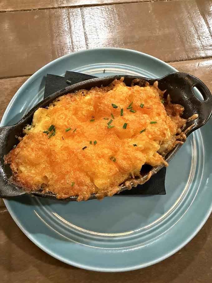 Bubbling, golden, and arriving in a cast iron dish. Bloom's mac and cheese is the hug you didn't know you needed today.