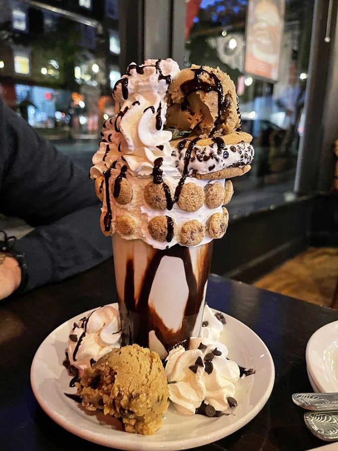 Cookie dough, chocolate drizzle, and enough toppings to make your grandmother quietly reconsider her pie recipe.