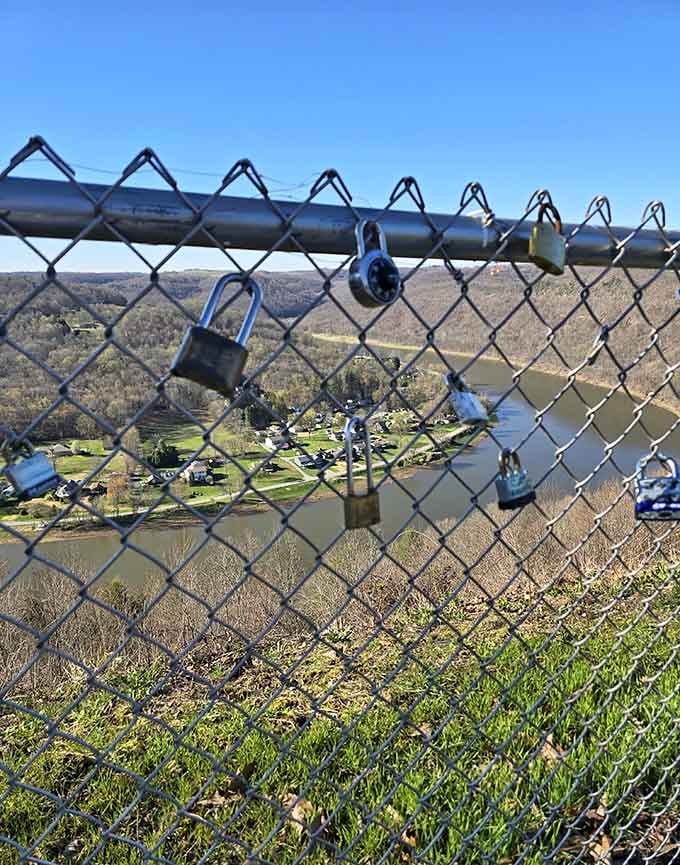 Love locks on the overlook fence, because apparently people visit Brady's Bend and immediately want to commit to something.