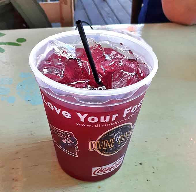 That deep red drink is cold, refreshing, and exactly what a warm Surfside Beach afternoon calls for.