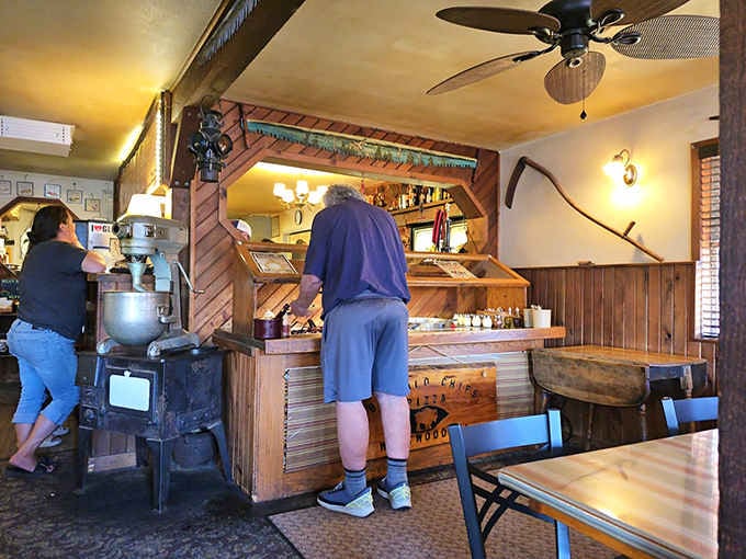 A warm wooden bar, ceiling fans spinning slowly, and the smell of something wonderful nearby. Perfect.