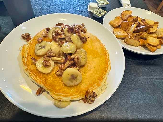 Golden pancakes stacked high and crowned with bananas and pecans, this is what weekend mornings were invented for.