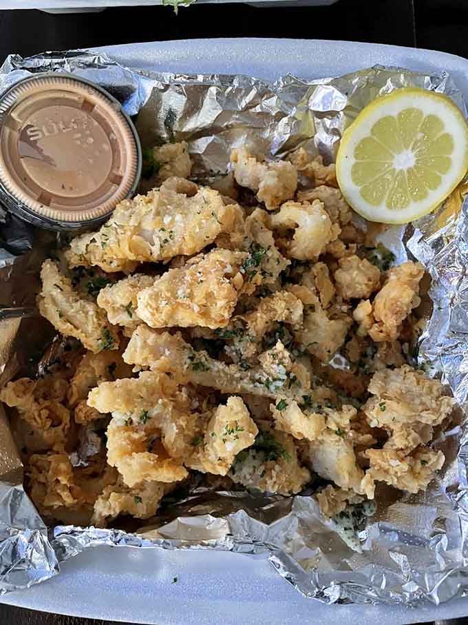 Calamari this perfectly fried and tender makes you forget every rubbery disappointment you've ever experienced at lesser establishments across town.