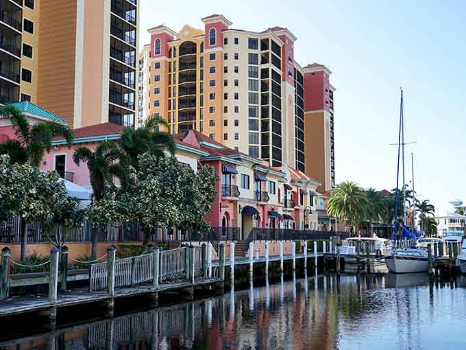 Cape Harbour's colorful waterfront buildings look like someone designed a Mediterranean village specifically for your Instagram feed.