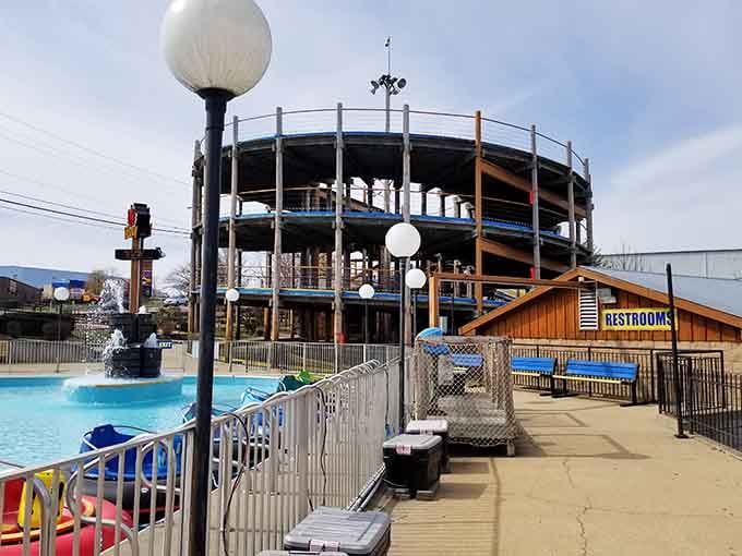 Multi-level outdoor structure rising above the bumper boat pool, proof that Branson never does anything halfway.