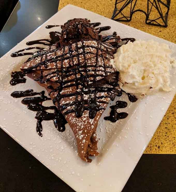 Dark chocolate cr&ecirc;pe, chocolate sauce drizzled everywhere, whipped cream on the side &mdash; this one is not for the faint of heart.