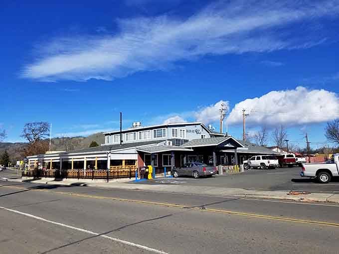 Main Street Bar and Grill standing tall under a big blue sky, exactly where a cold drink and a hot meal should be.
