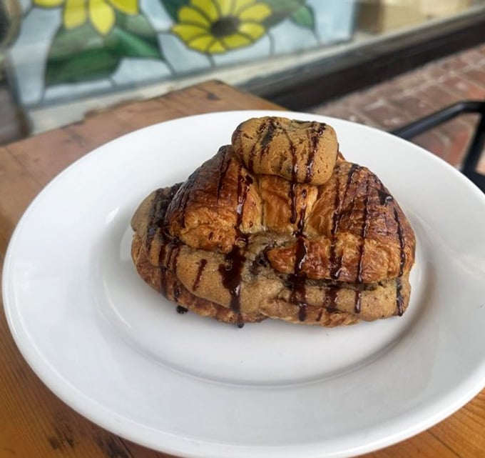 A chocolate-drizzled croissant that makes you question whether dessert for breakfast was ever really wrong to begin with.