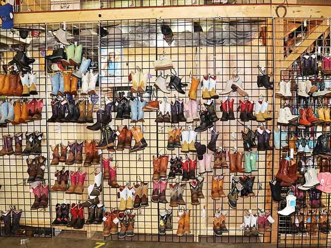 A wall of cowboy boots in every color, because life's too short for boring footwear choices.