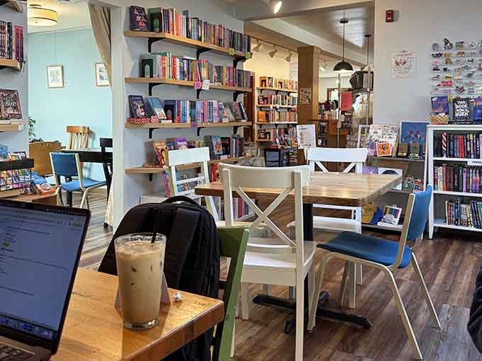 Iced coffee, open laptop, books everywhere. This is what a productive afternoon is supposed to look like.