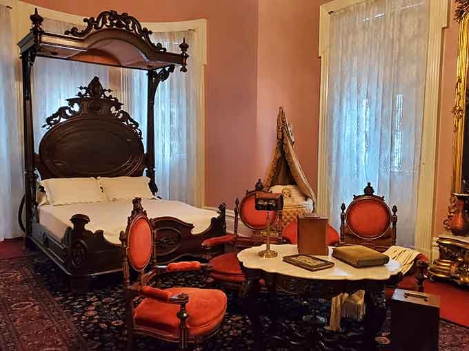 A bedroom so dramatically furnished, even your most extra aunt would say, "That's a bit much."