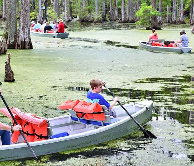Real people, real boats, real swamp. No movie magic required when the scenery does all the work.