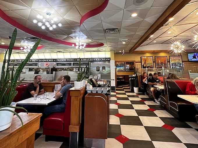 Happy diners, warm booths, and the quiet hum of a room full of people eating well together.